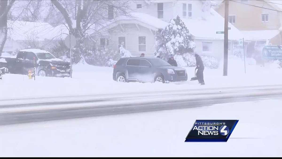 Erie smashes snowfall record with flakes still falling