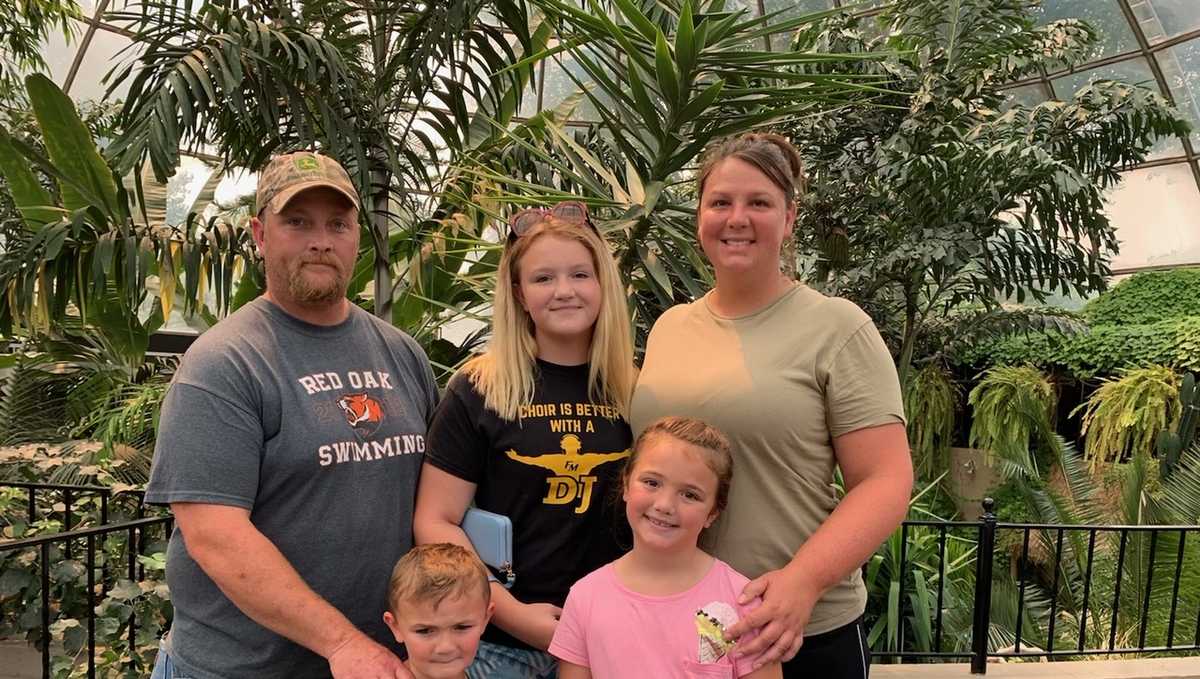 Iowa farming community harvest crop of late farmer who died
