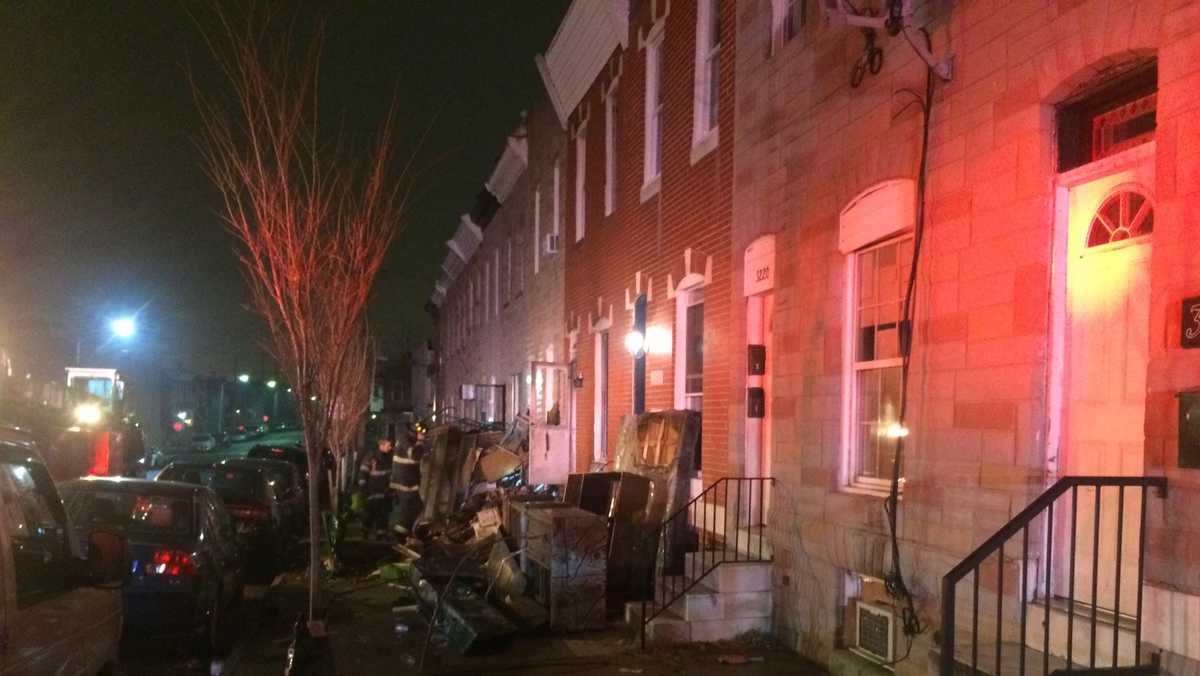 Crews battle east Baltimore rowhome fire