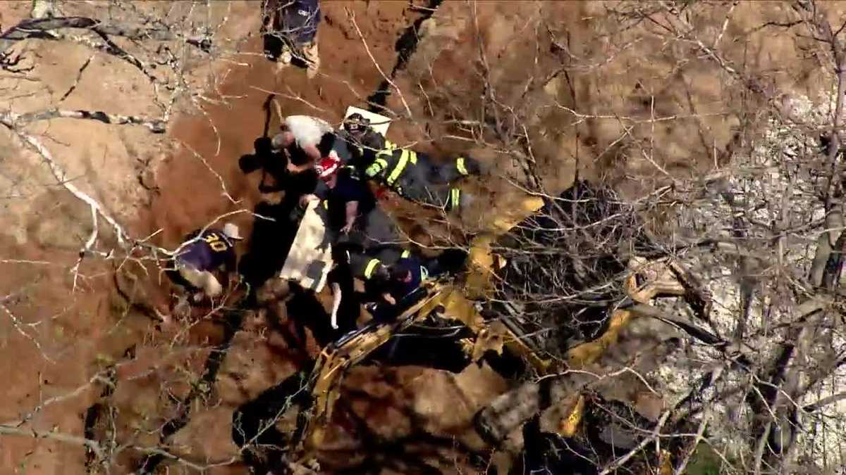 Crews free man trapped in mud in Fallston