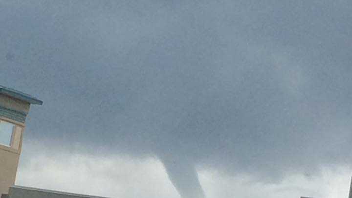Check out these funnel cloud photos from Tuesday (8/15)