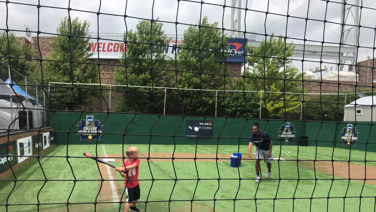 Fans show off team colors at CWS Fan Fest