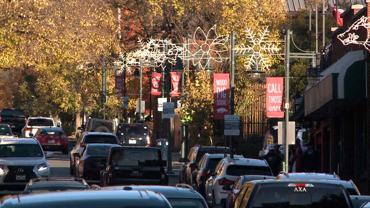 Texas, Arkansas fans fill Fayetteville for rivalry game