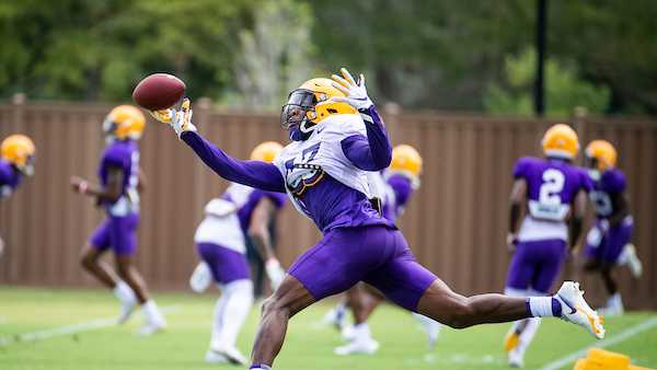 The LSU Tigers continue fall camp with another practice with shoulder pads.