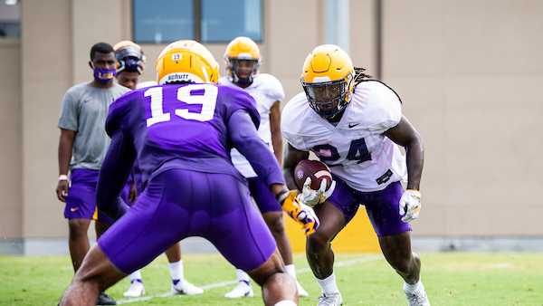 The LSU Tigers continue fall camp with another practice with shoulder pads.
