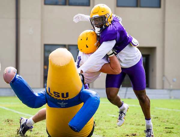 The LSU Tigers continue fall camp with another practice with shoulder pads.