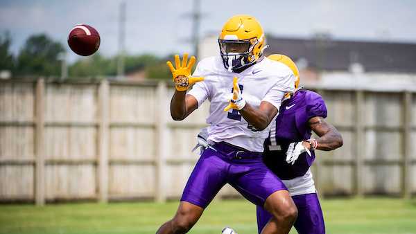 The LSU Tigers continue fall camp with another practice with shoulder pads.