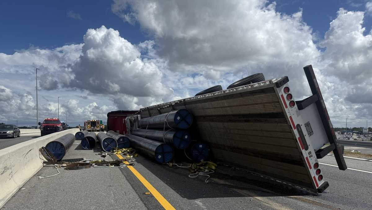 Turnpike exit ramp to SR-528 reopens after semi-truck overturns