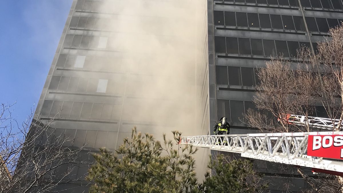 12-story downtown building evacuated over heavy smoke