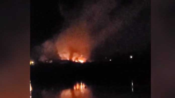 FD: Officials investigating after massive fire at lumber shop in ...