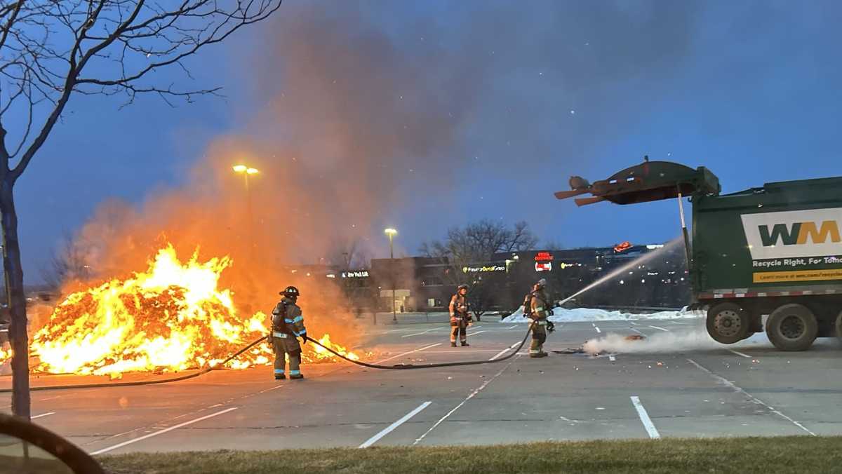 Omaha firefighters battle massive trash fire