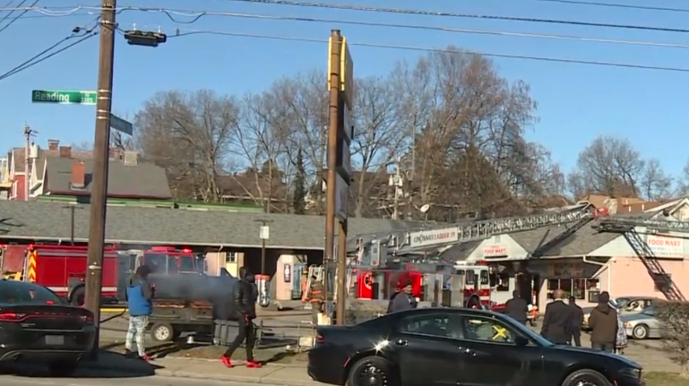 Fire crews battle two-alarm fire at food mart in Avondale