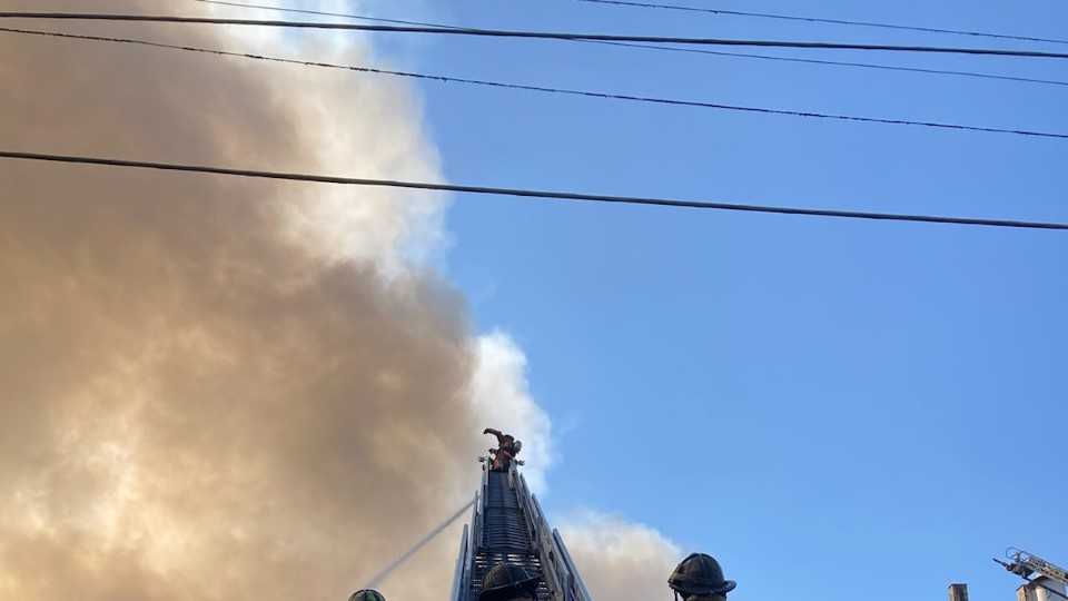 PHOTOS: Crews battling large fire in Camp Washington Saturday morning