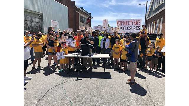 Firefighters, supporters rally to prevent proposed disbandment of 2 ...