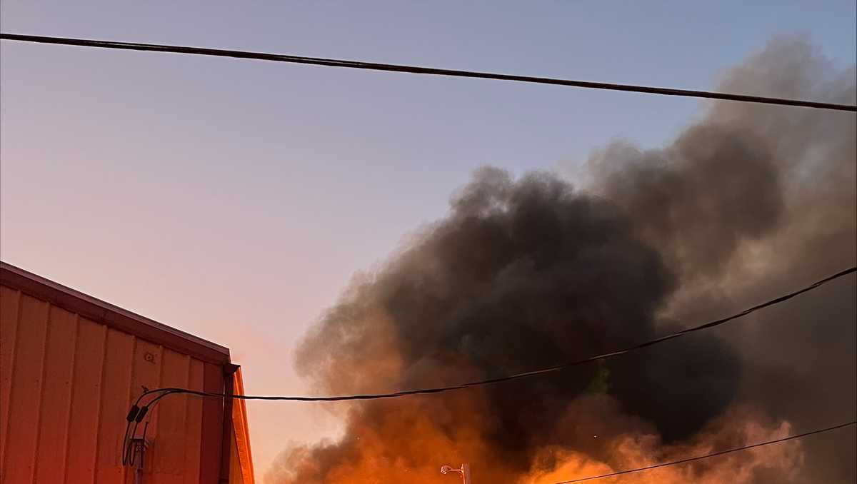 Louisville Avenue fire threatened auto shop before crews put it out