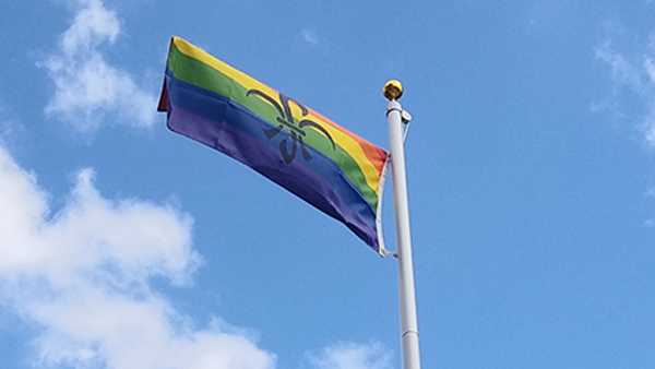 For first time in history, Pride flag flies at Louisville Metro Hall