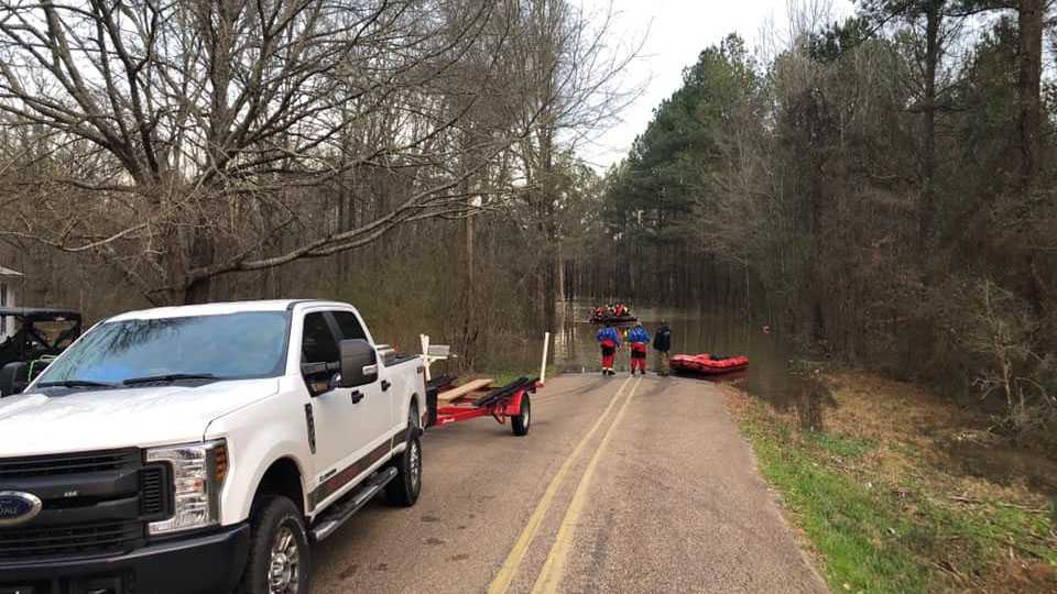 Photos: First responders rescue flood victims