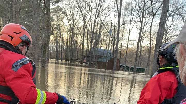 Photos: First responders rescue flood victims