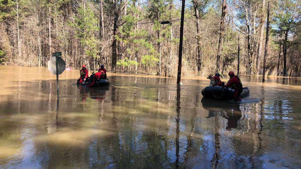 Photos: First responders rescue flood victims