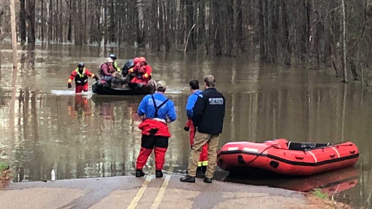 Photos: First responders rescue flood victims