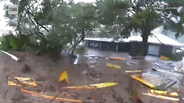 Woman sees her wrecked home after hurricane