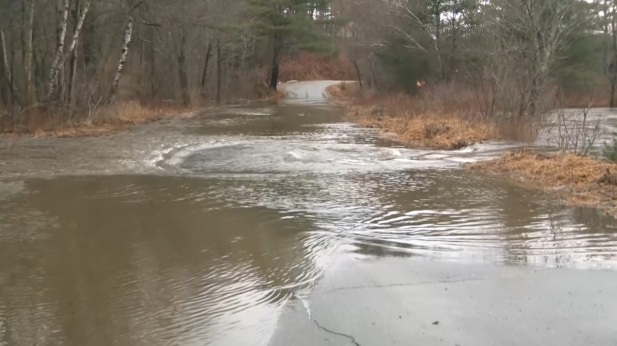 Heavy rain floods roads in some NH communities