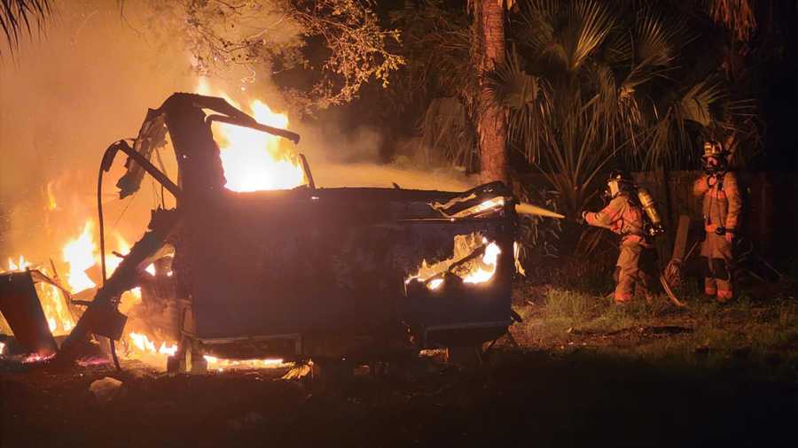 Pull-behind camper catches fire in Fort Myers