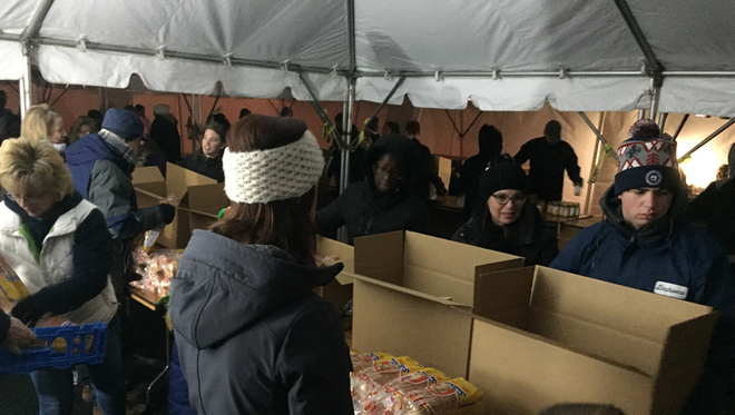 Volunteers line up to help Lancaster County Project For The Needy