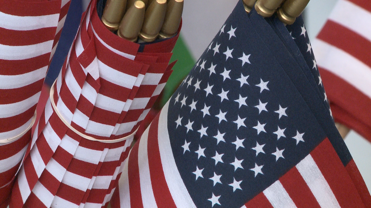 Students receive donated American flags to say Pledge of Allegiance at home