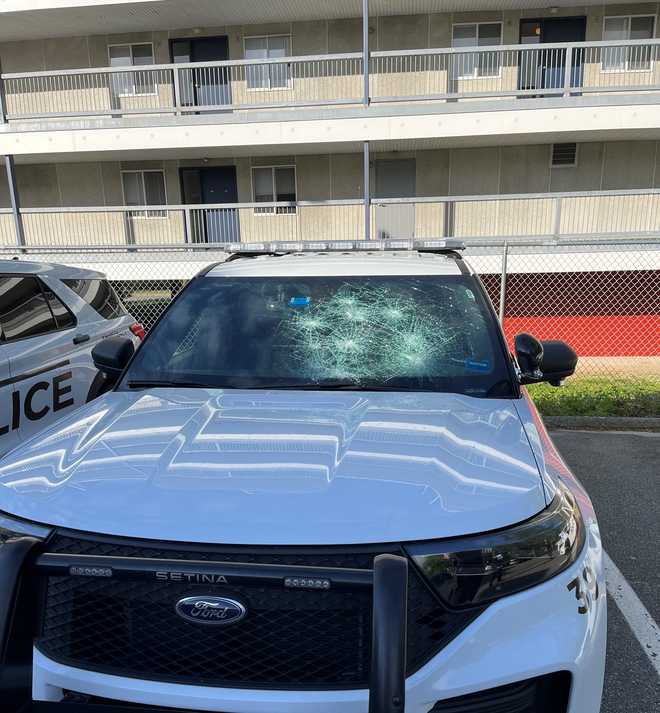 A Saco man is accused of smashing police cruisers with a hammer