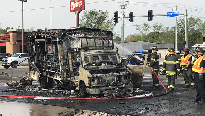 Passengers escape out window during city bus fire
