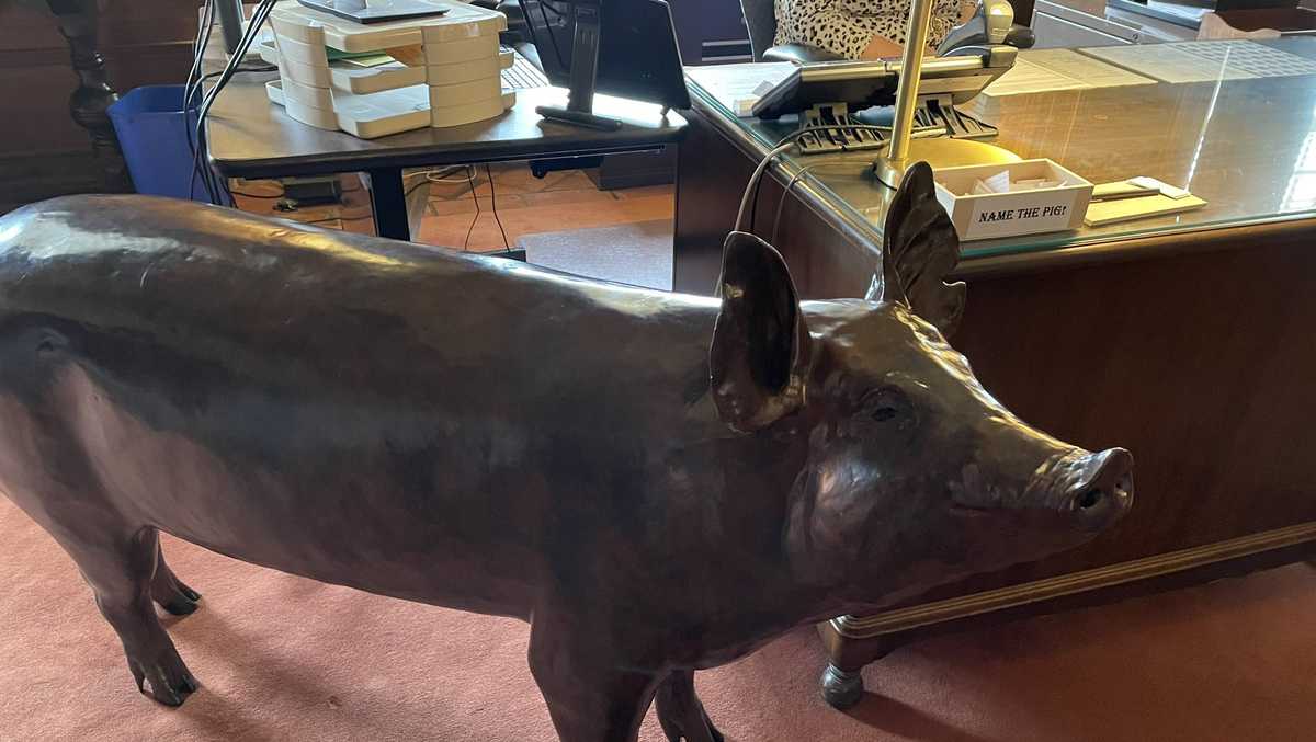 Nebraska Gov. Jim Pillen names metal pig in his office