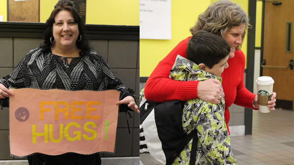 Teachers at Covington elementary school greet students with hugs for ...
