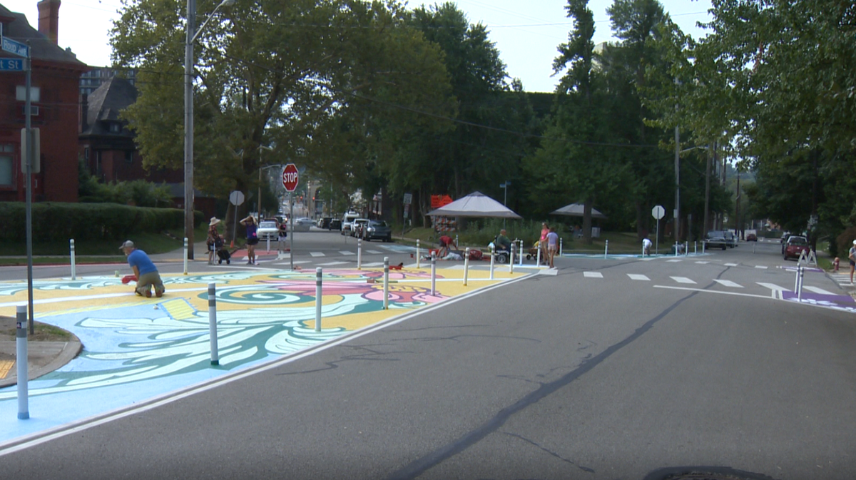 Murals decorate intersection in Pittsburgh's Friendship neighborhood