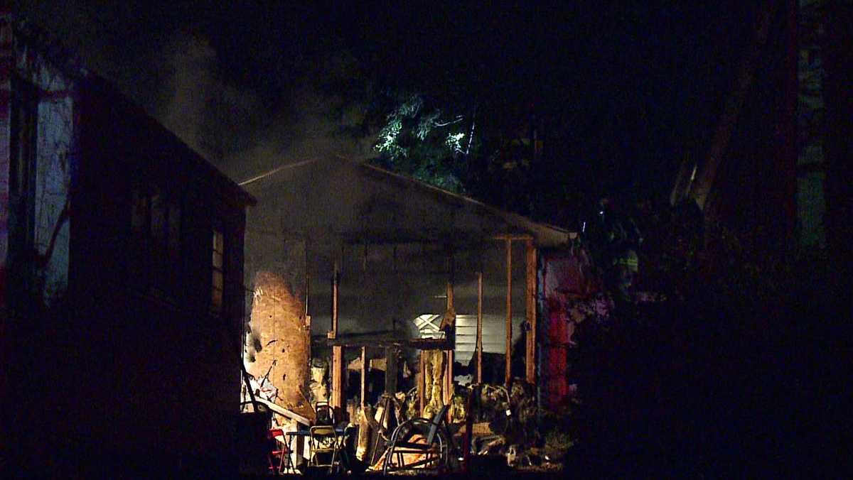 2 cars, garages destroyed by overnight fire