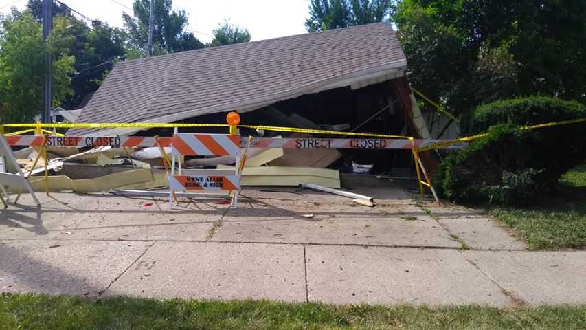 Speeding driver crashes into garage, causing it to collapse