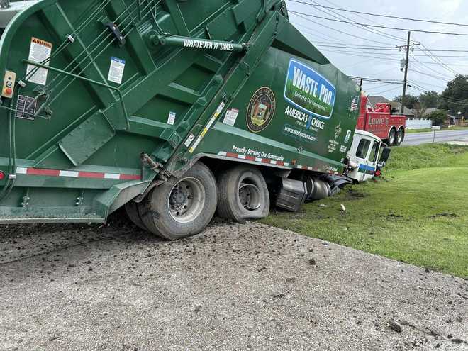 Louisiana garbage truck crashes into ditch