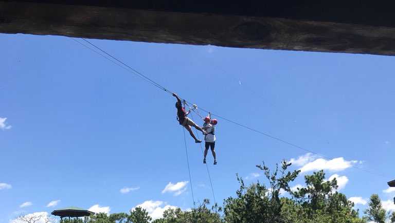 VIDEO: Man, child stuck on zipline above gators at Gatorland
