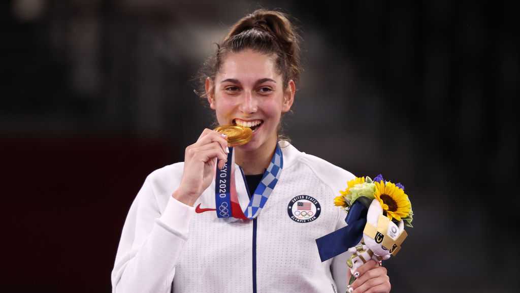 Why Olympians bite their medals and what they do with them