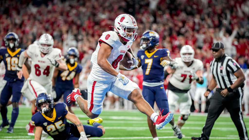 Miami (Ohio) upsets No. 23 Toledo 23-14 to win MAC championship