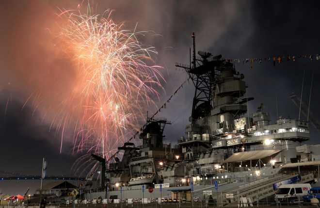 Check out these photos of fireworks above the USS Iowa battleship