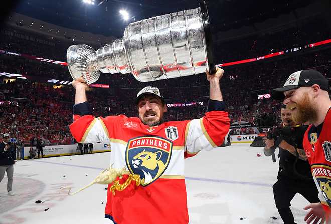 Florida Panthers re-signing Aaron Ekblad and Brad Marchand, AP sources say