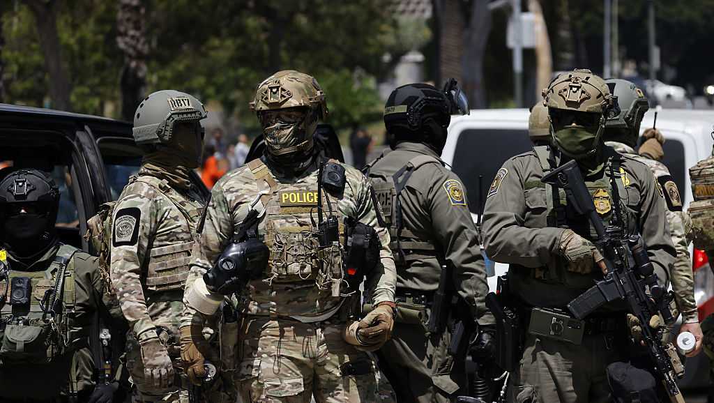 California bans most law enforcement officers from wearing masks