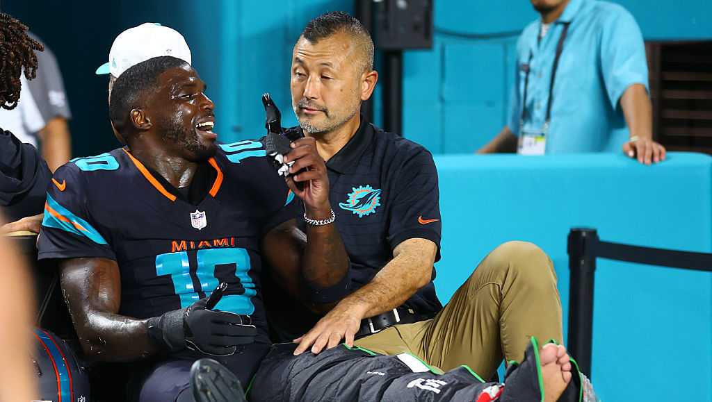 Dolphins’ Tyreek Hill carted off field and taken to hospital with serious left leg injury