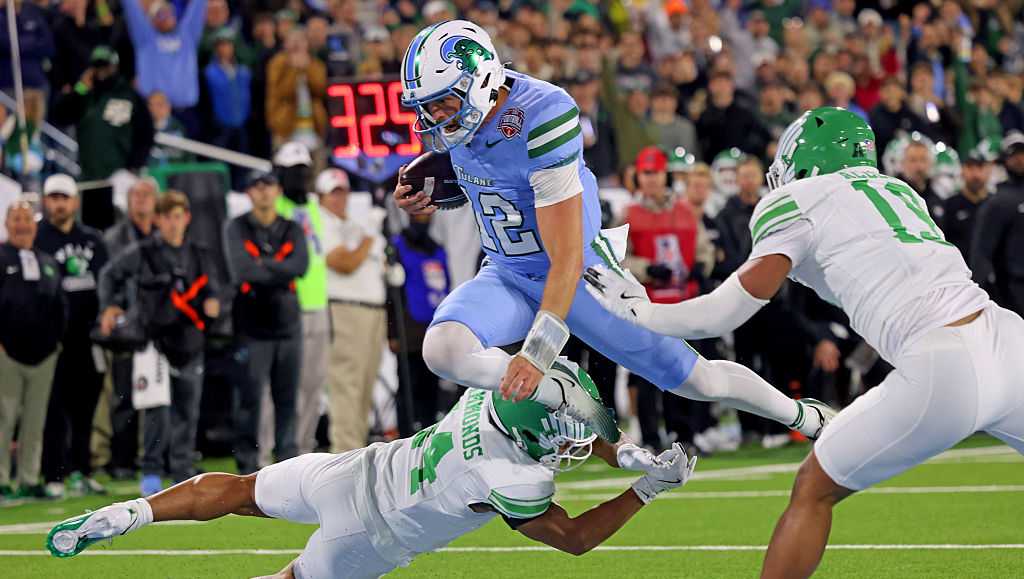 Tulane wins conference, earn berth into College Football Playoff
