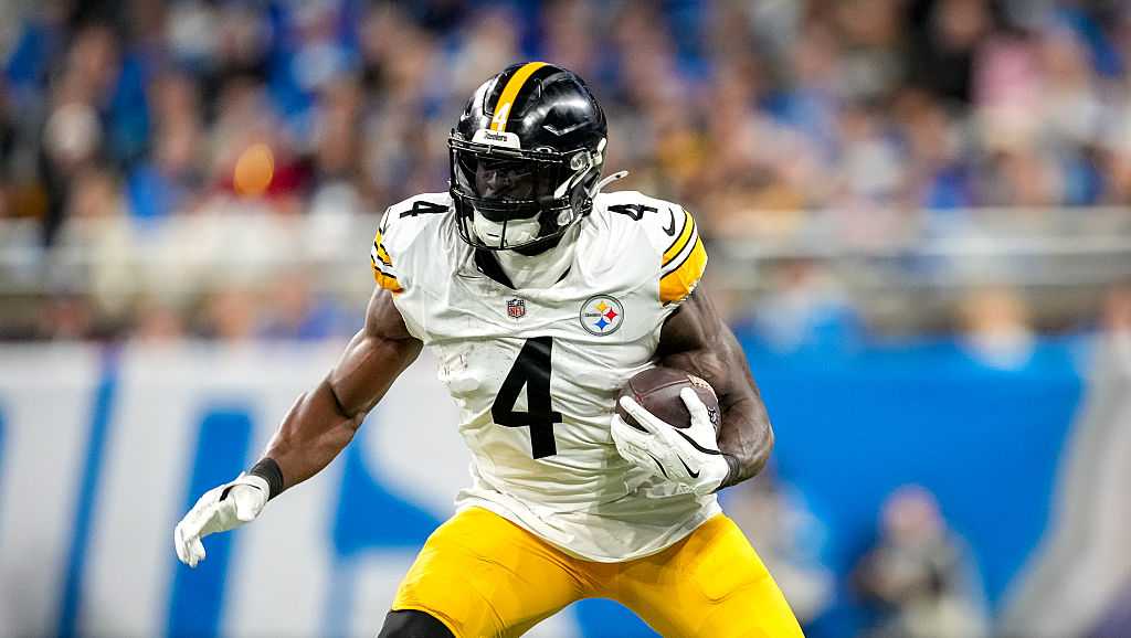Steelers receiver DK Metcalf swipes at Lions fan leaning over railing ...