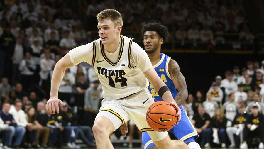 Hawkeyes fend off late Rutgers rally to earn 68-62 victory