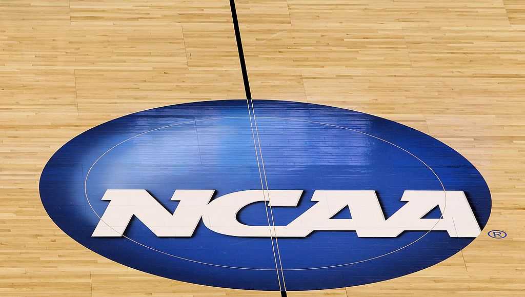 Man who helped recruit players into a sprawling NCAA basketball point ...