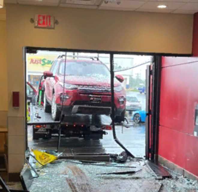 Graham firefighters respond after car crashes into a Wendy's