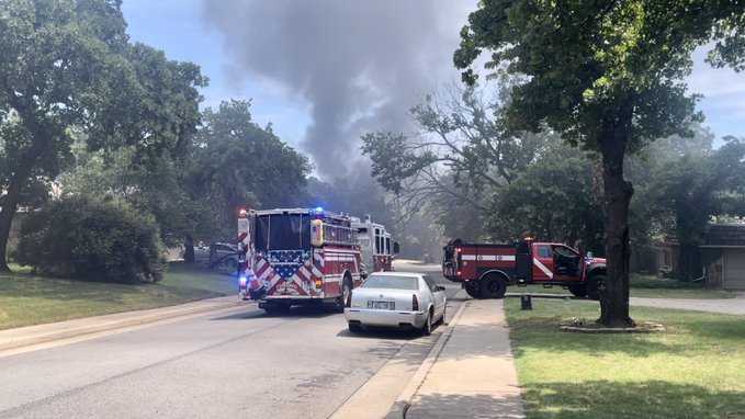 Fire crews battle house fire in Edmond